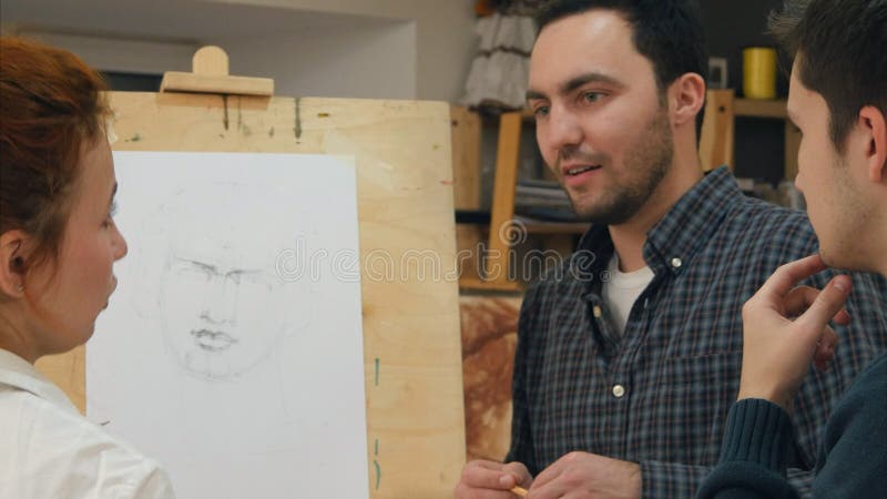 Two Male Students Asking Questions about Drawing Techniques Stock Image ...