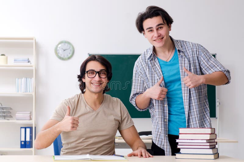 The Two Male Students in the Classroom Stock Image - Image of classroom ...