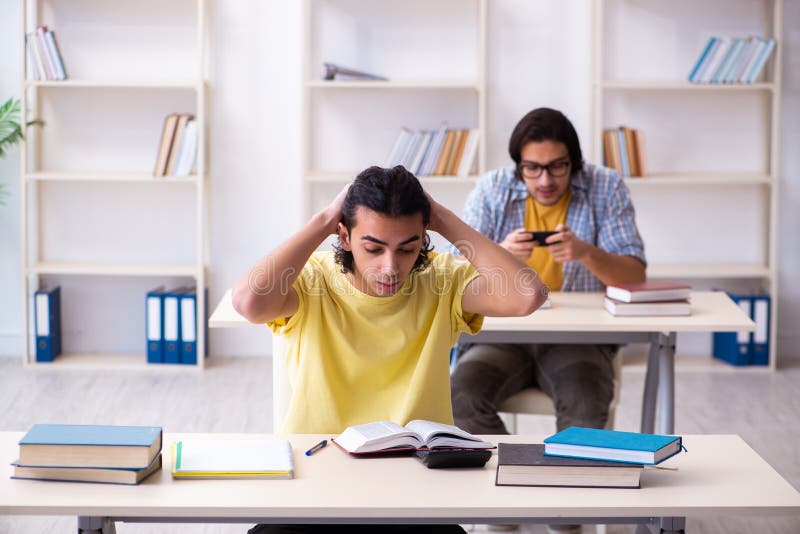 Two Male Students in the Classroom Stock Photo - Image of learning ...