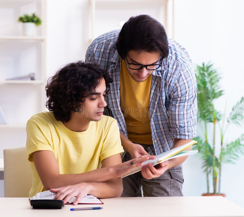 Two Male Students in the Classroom Stock Image - Image of discussion ...