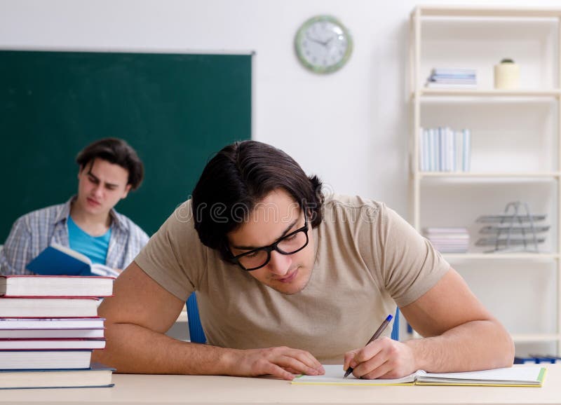 Two Male Students in the Classroom Stock Photo - Image of classroom ...