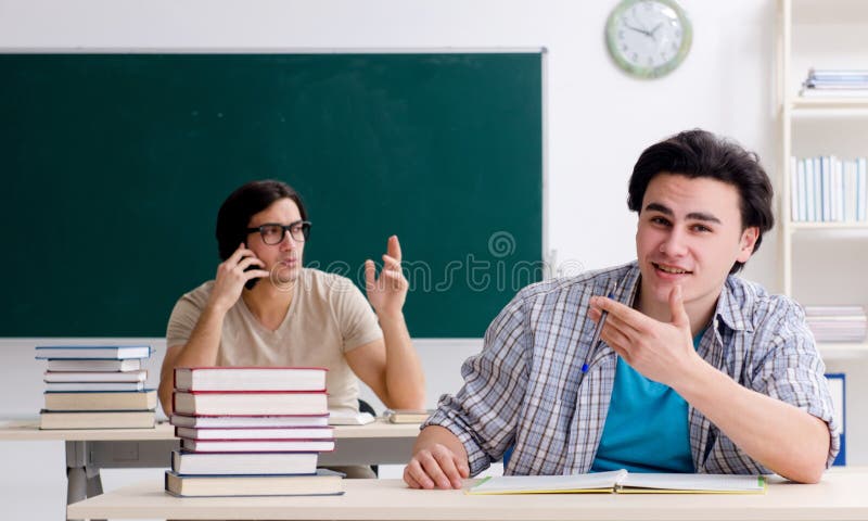 Two Male Students in the Classroom Stock Photo - Image of chalkboard ...