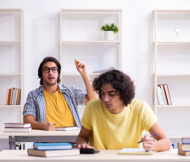Two Male Students in the Classroom Stock Photo - Image of classmates ...