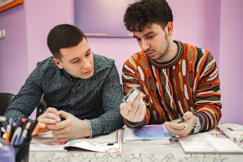 Two Male Students Learning Together at Language School Stock Image ...