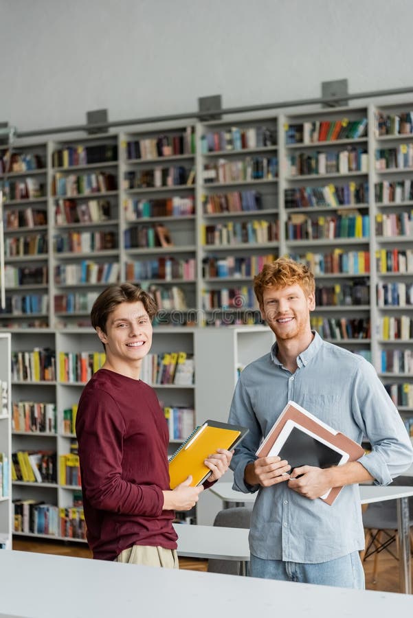 Two Male Students Studying Avidly in Stock Image - Image of pair ...