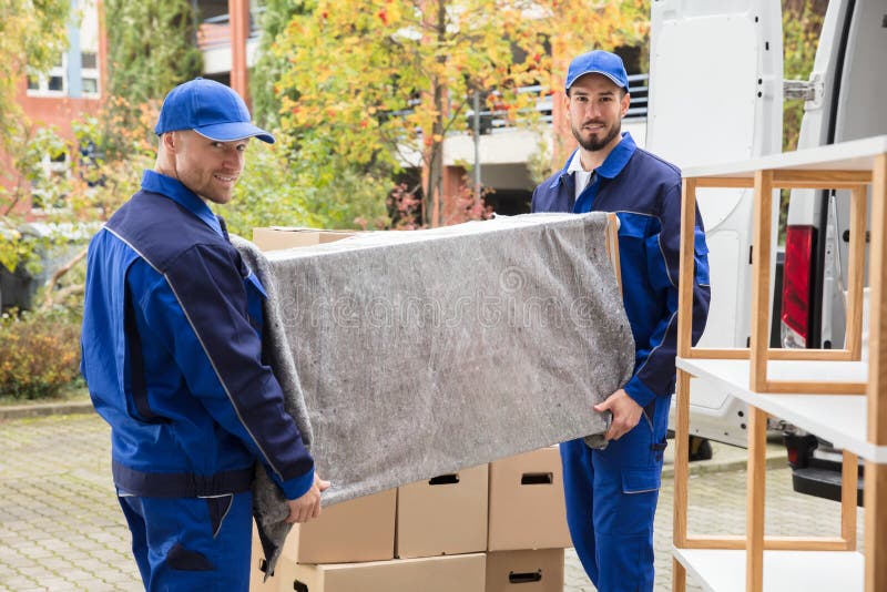 Two Male Worker Unloading Furniture from Truck Stock Image - Image of ...