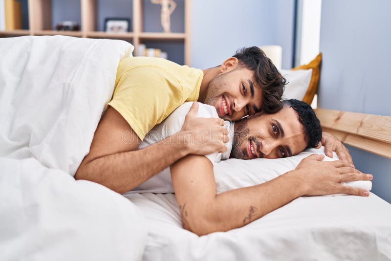 Two Man Couple Hugging Each Other Lying on Bed at Bedroom Stock Image ...
