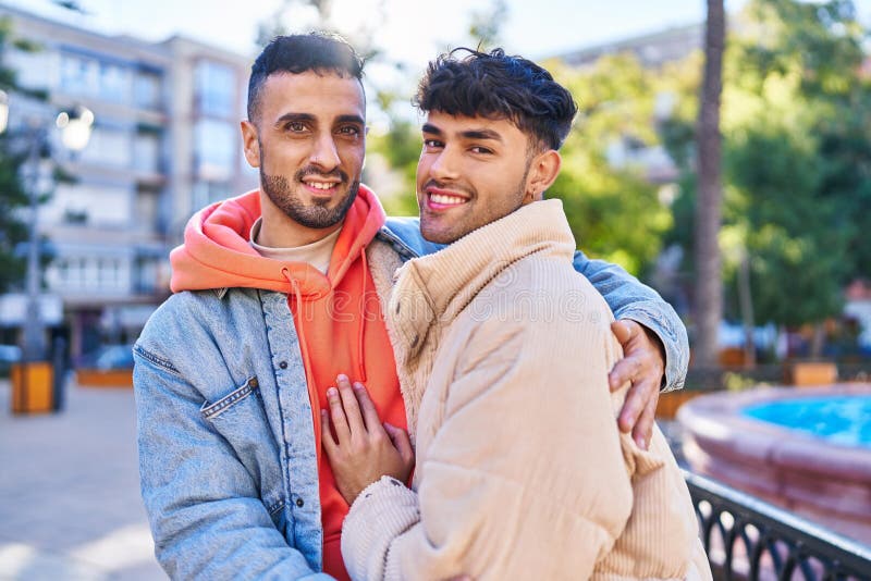 Two Man Couple Hugging Each Other Standing at Park Stock Image - Image ...