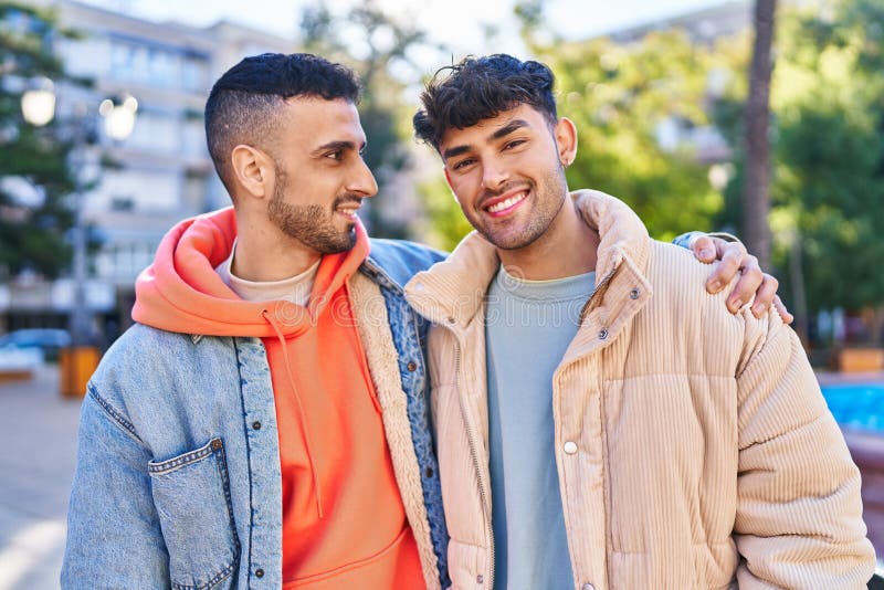 Two Man Couple Hugging Each Other Standing at Park Stock Photo - Image ...