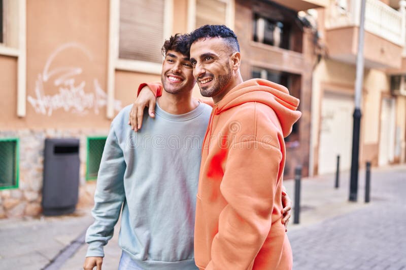 Two Man Couple Hugging Each Other Standing at Street Stock Photo ...