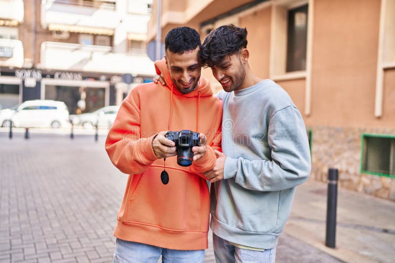 Two Man Couple Using Professional Camera at Street Stock Photo - Image ...
