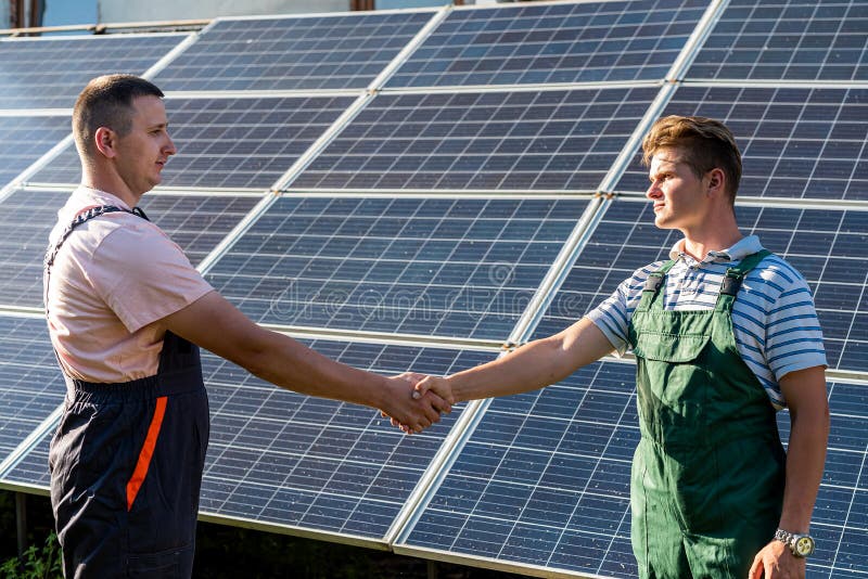 Two Man Finished Installation New Solar Panel Station. Green Energy ...