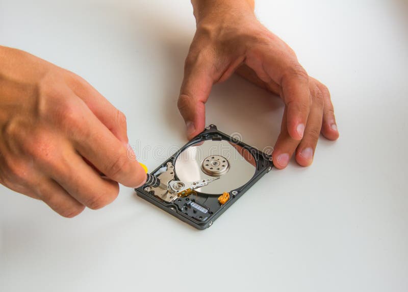 Fixing Damaged Hard Disc Using Screwdriver Stock Photo - Image of data ...