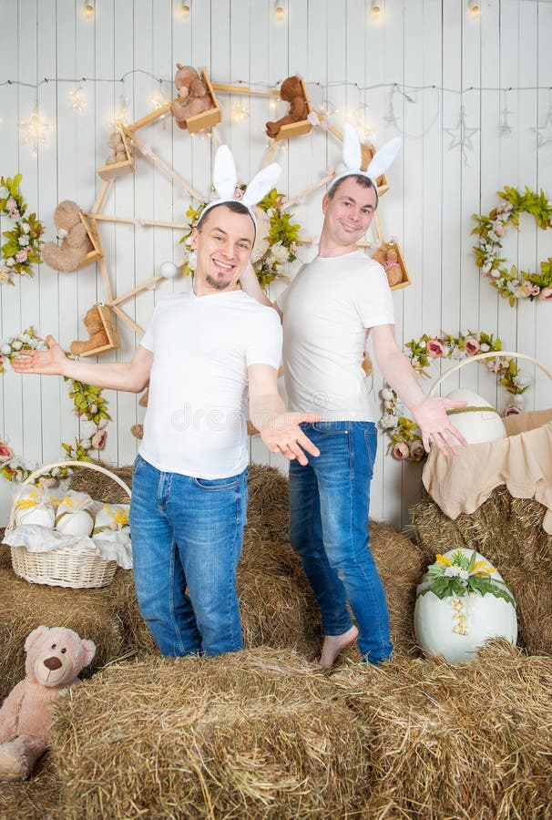 Two Man with Rabbit Ears Having Fun Standing in the Haystack Stock ...