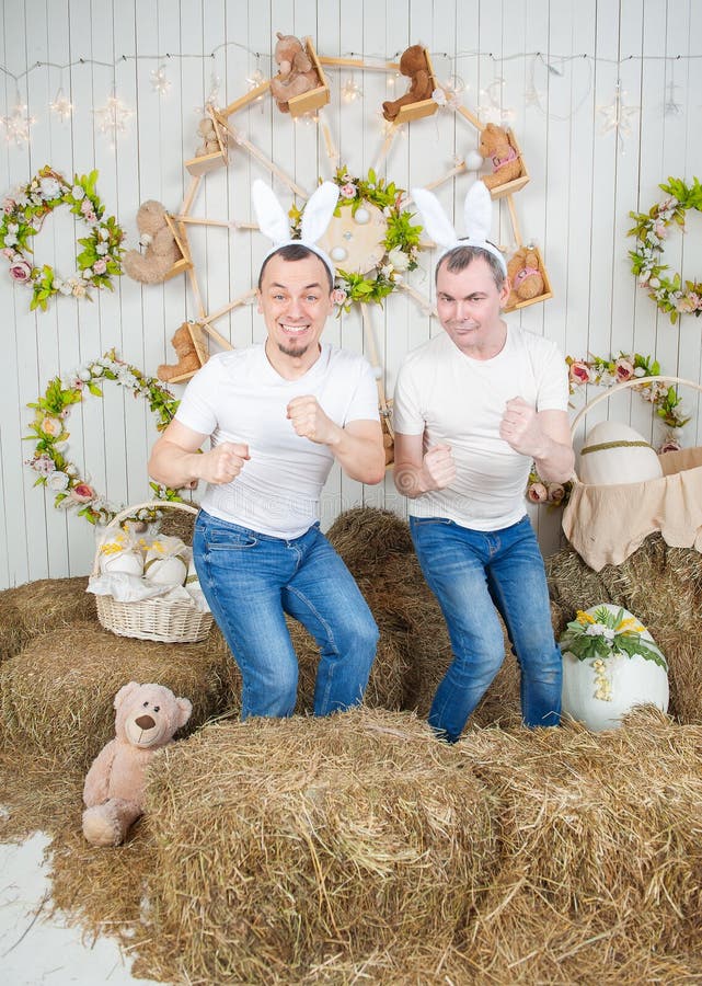 Two Man with Rabbit Ears Having Fun Standing in the Haystack Stock ...