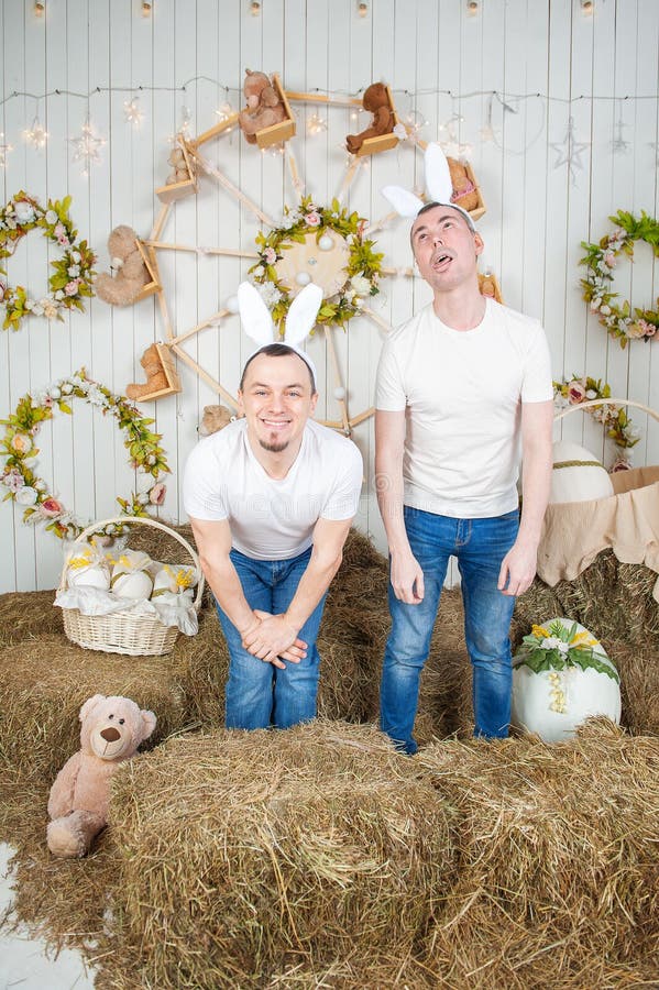 Two Man with Rabbit Ears Having Fun Standing in the Haystack Stock ...
