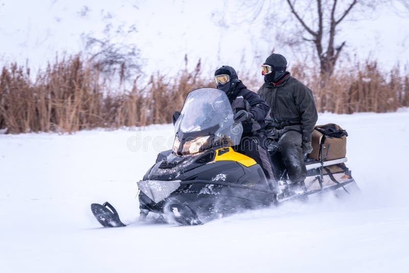 Snowmobile riding stock image. Image of snow, snowmobile - 574685
