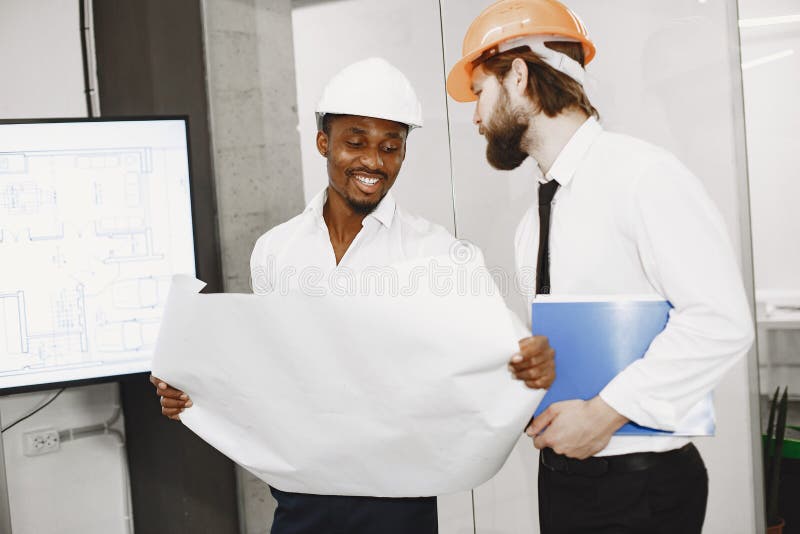 Two Managers in the Office with Helmets Stock Image - Image of ...