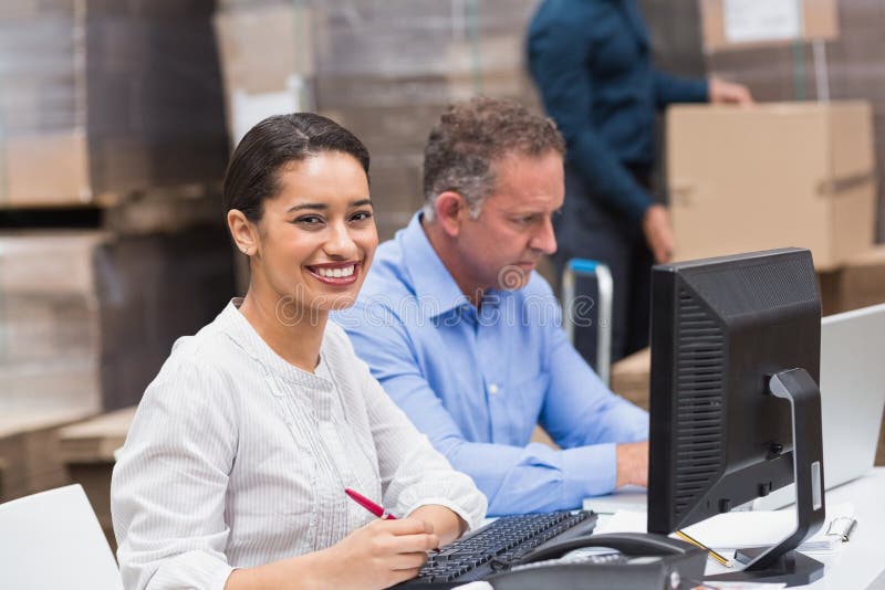Two Managers Working on Laptop at Desk Stock Image - Image of adult ...