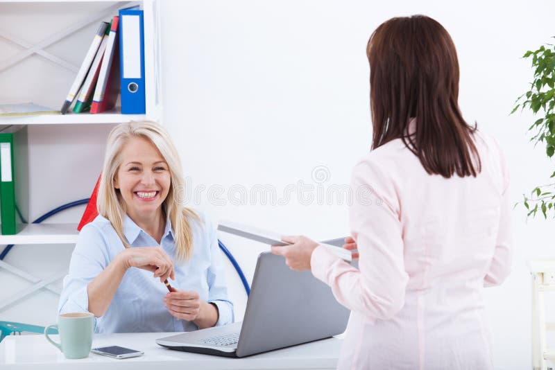 Two Managers Working on Laptop in Office. Stock Image - Image of busy ...