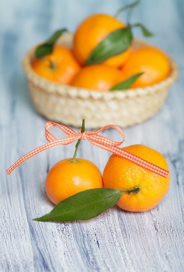 Two Mandarins on the Background of Basket Stock Photo - Image of meal ...
