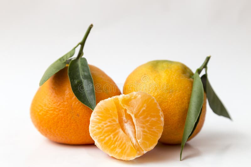 Two Mandarins and Half Peeled Stock Photo - Image of diet, fruits: 83148990