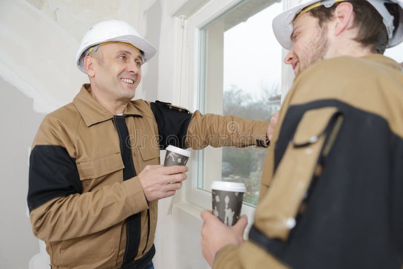 Two Manual Workers Enjoying Coffee Break Stock Photo - Image of coffee ...