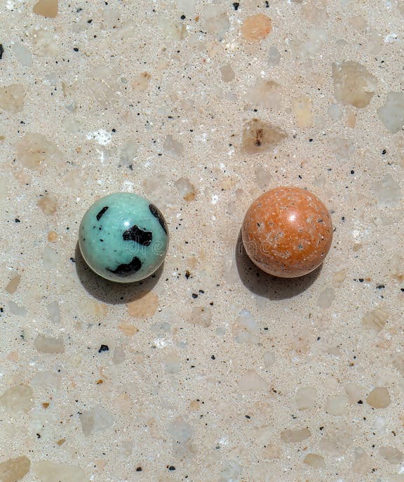 Two Marbles on a Speckled Surface. Stock Illustration - Illustration of ...