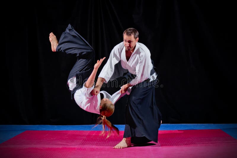 Two martial arts fighters stock photo. Image of hakama - 44232336