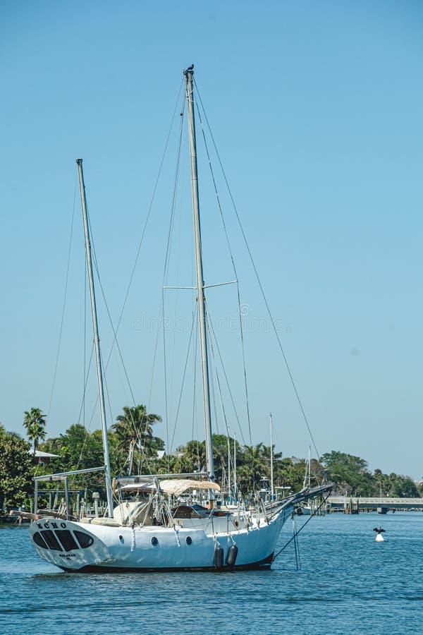 Two Masted Sailboat, Moored in a Tropical Bay Stock Photo - Image of ...