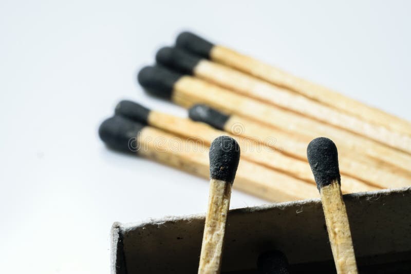 Two Match Sticks in Focus Over the Edge of a Match Box and Multiple ...