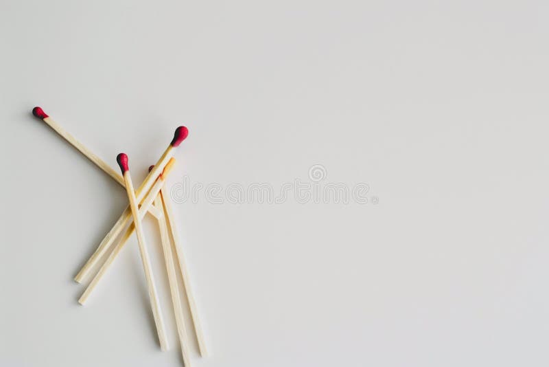 Two Matches are Placed on a White Surface with One Matchstick Stock ...