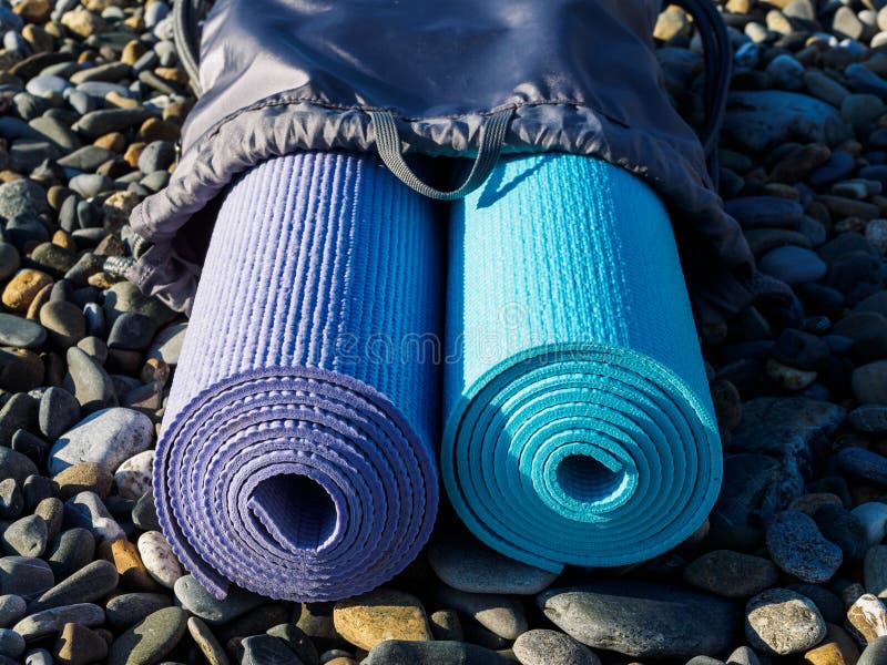 Two Mats for Yoga or Pilates in a Case on the Beach Stock Photo - Image ...