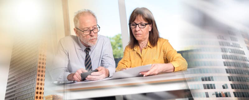 Two Mature Business People Working Together; Multiple Exposure Stock ...