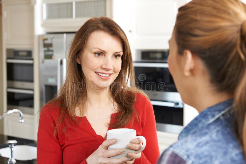 1,330 Mature Women Talking Kitchen Stock Photos - Free & Royalty-Free ...