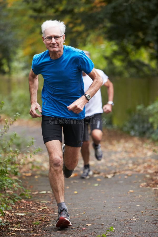 Older Man Jogging Running on Meadow Stock Photo - Image of people ...