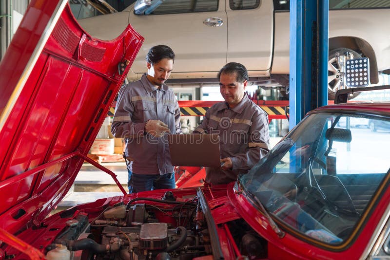 Two Mechanic in Gray Uniform Maintenance or Inspection Work on a ...