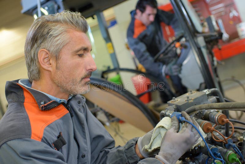 Mechanics Working on Agricultural Machine Stock Image - Image of ...