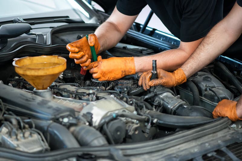 Two Mechanics Working on a Vehicle Stock Image - Image of engine ...