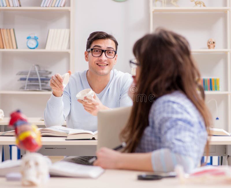 Two Medical Students Studying in Classroom Stock Image - Image of ...