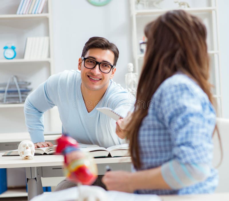 Two Medical Students Studying in Classroom Stock Image - Image of ...
