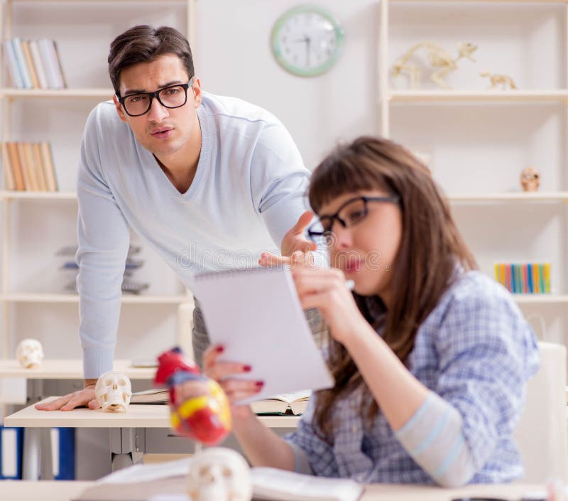 Two Medical Students Studying in Classroom Stock Photo - Image of ...