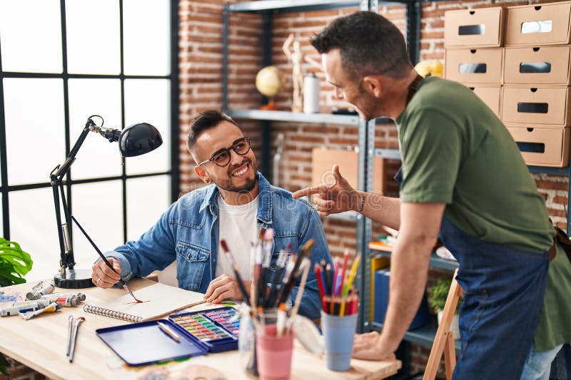 Two Men Artists Smiling Confident Drawing on Notebook at Art Studio ...