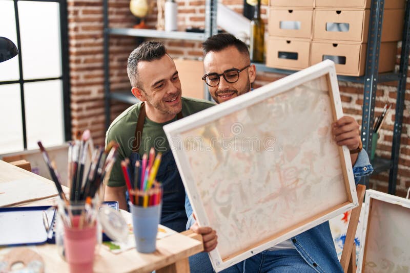 Two Men Artists Smiling Confident Looking Draw at Art Studio Stock ...