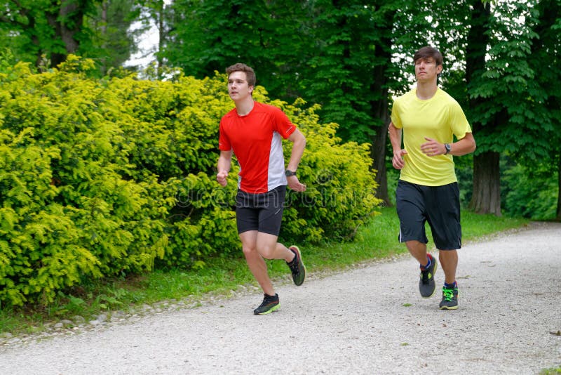 Two Men Athletes Running / Jogging Stock Image - Image of event ...