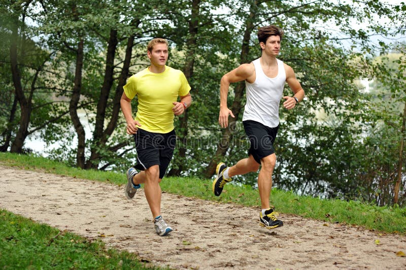 Two Men Athletes Running / Jogging Stock Image - Image of event ...