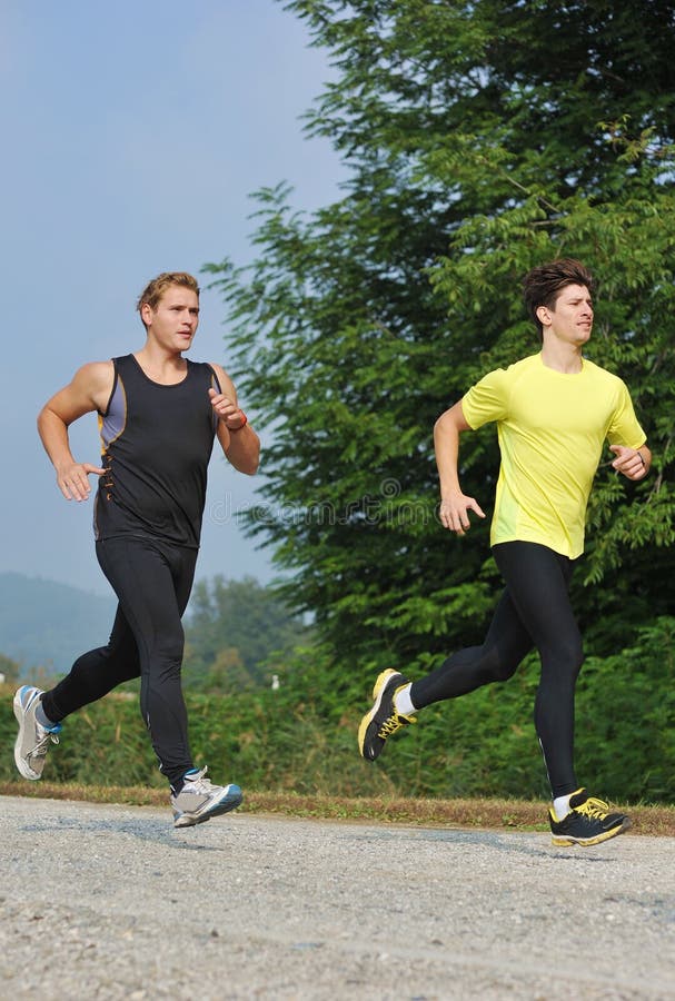 Two Men Athletes Running / Jogging Stock Photo - Image of distance ...