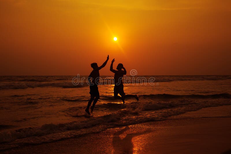 Two men on the beach. stock image. Image of outdoor, concept - 90487207