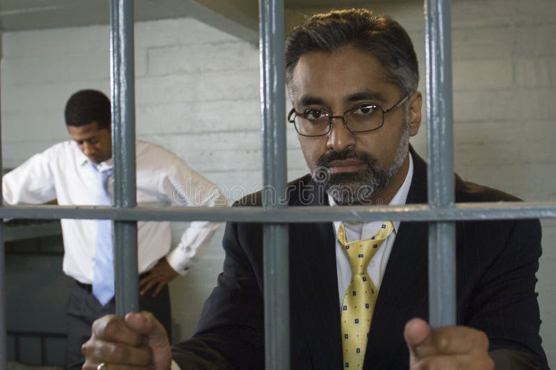 Two Men Behind Bars stock image. Image of cell, glasses - 29662879