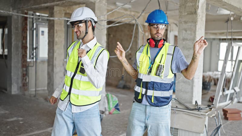 Two Men Builders Smiling Confident Dancing at Construction Site Stock ...
